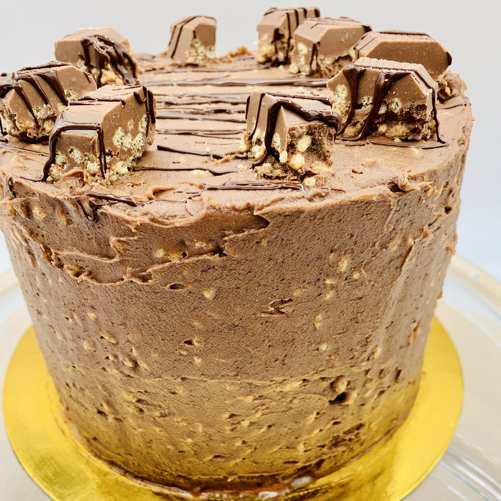 Compra Pastel turrón Suchard – Nurita Cakery